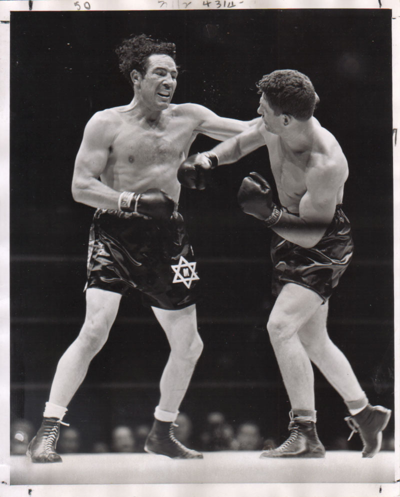 Lou Nova would defeat Max Baer in the first televised heavyweight prizefight June 1